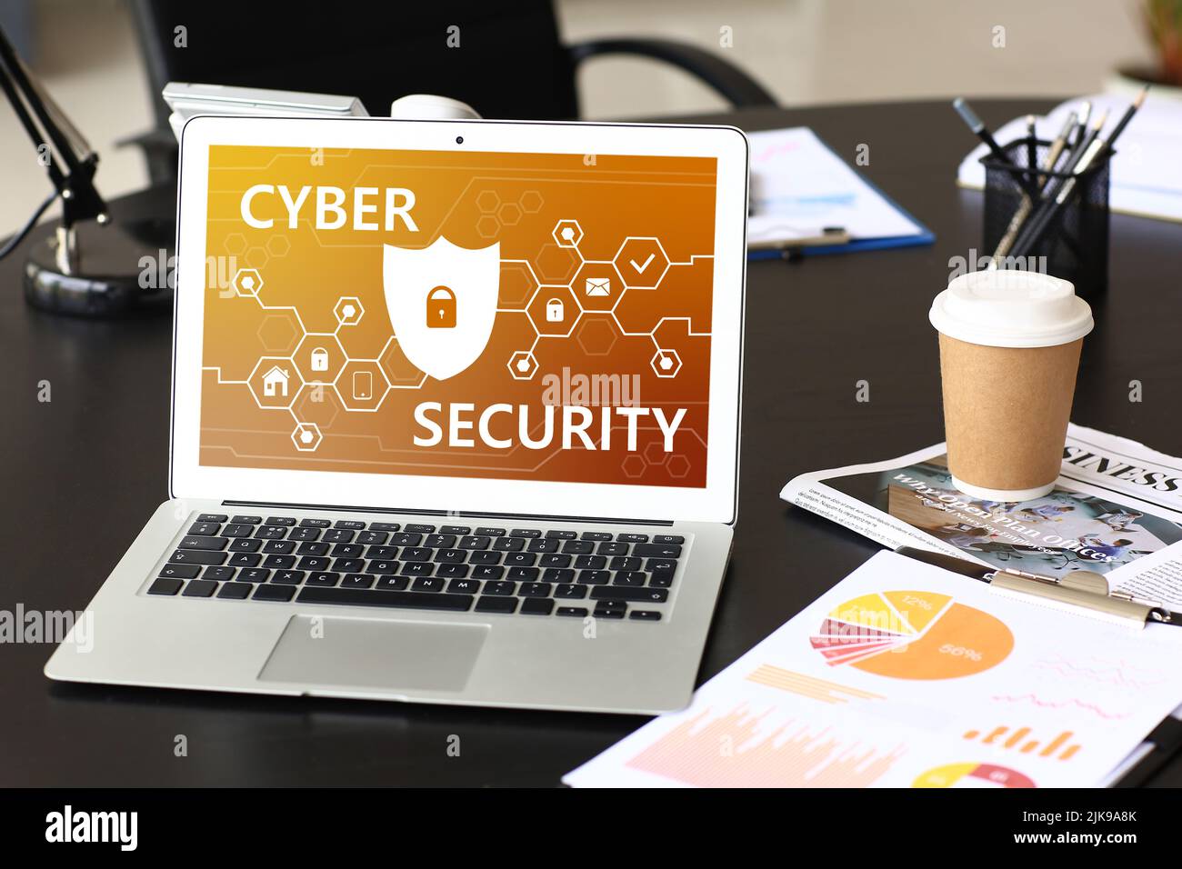 Modern laptop on table in office. Cyber security concept Stock Photo ...