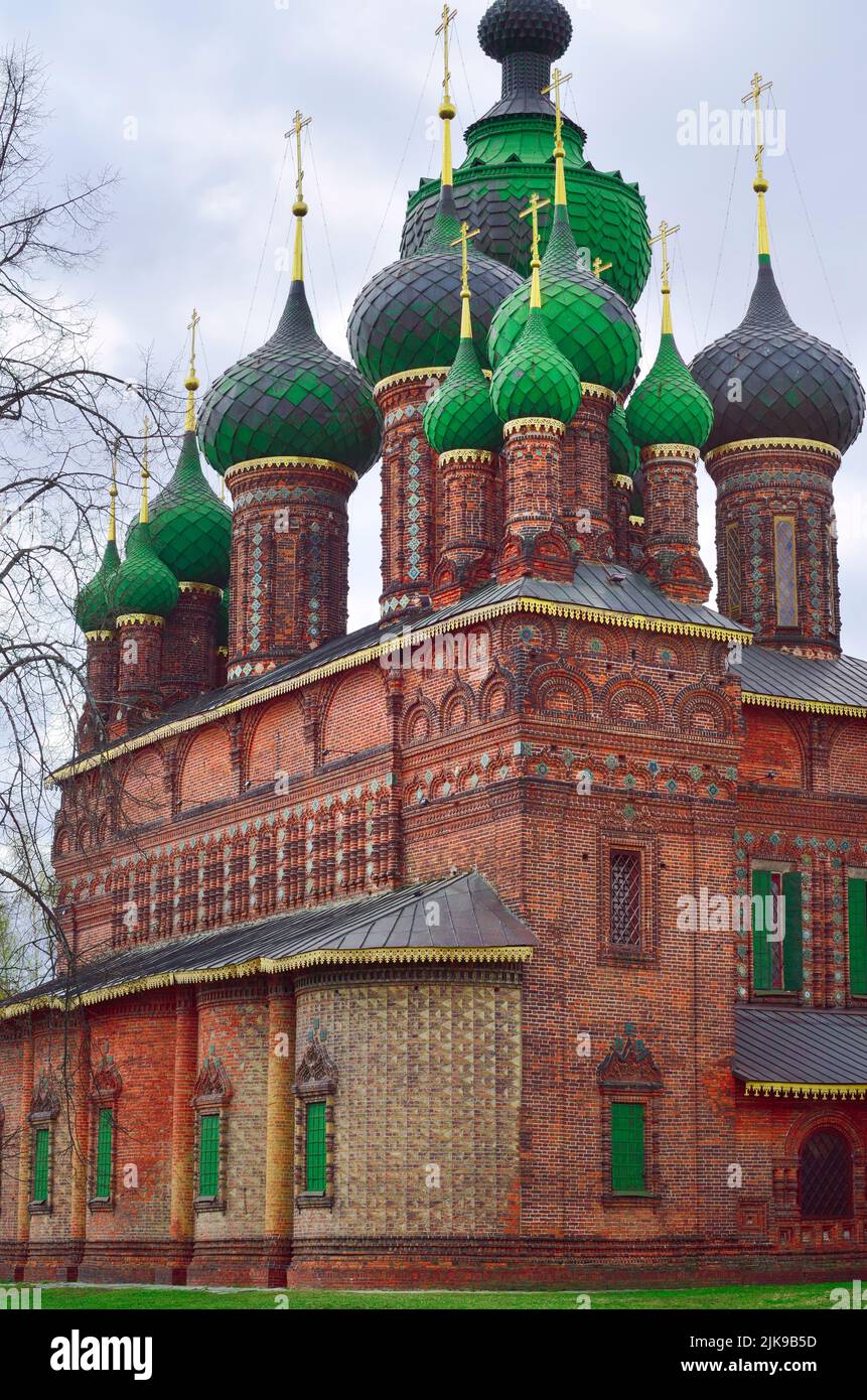 The Church of John the Baptist. Domes of a brick church with colored ...