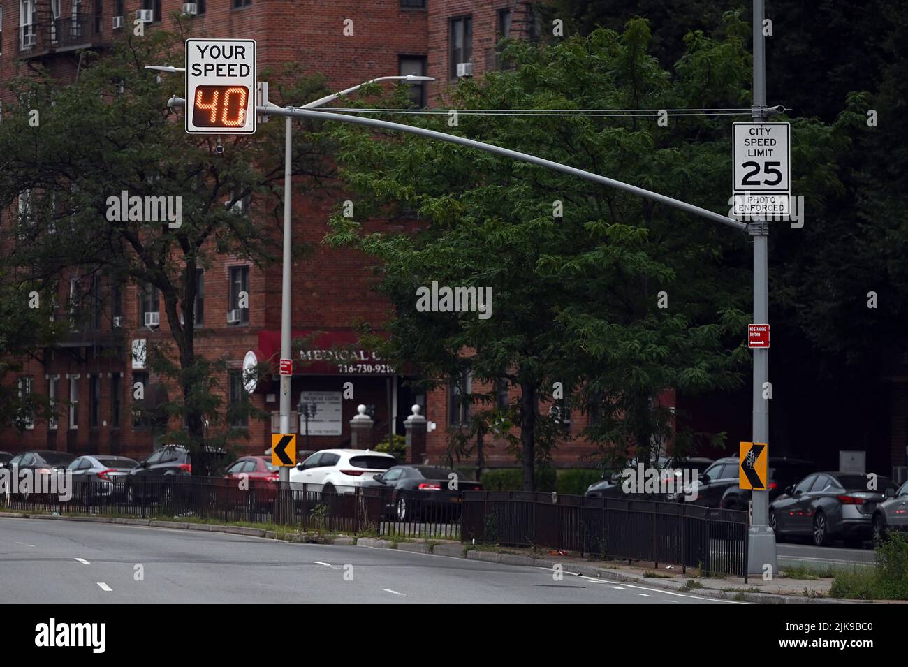A speed indicator shows an approaching car driving at 40 mp/h along ...