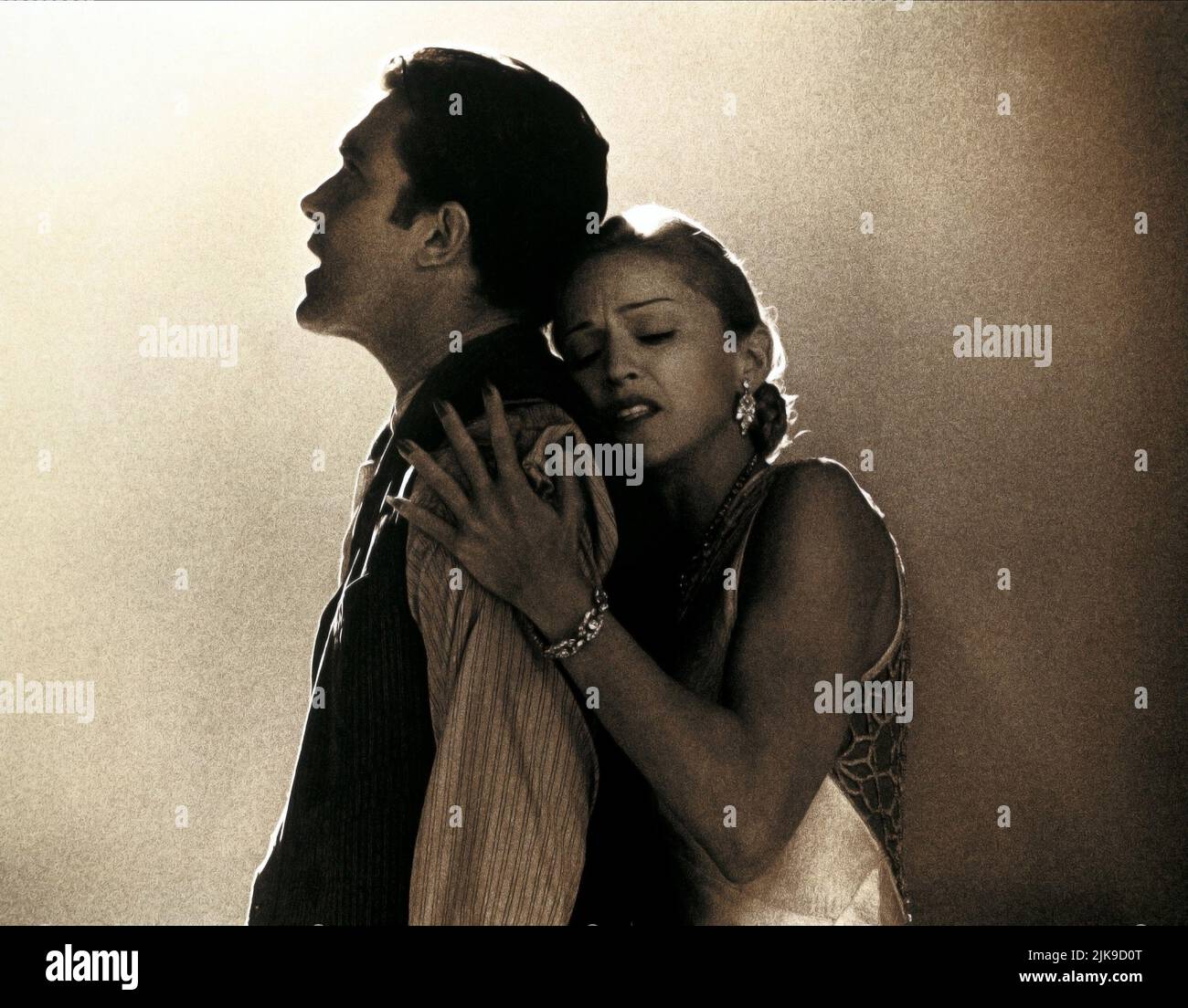 Antonio Banderas & Madonna Film: Evita (USA 1996) Characters: Che, Eva ...