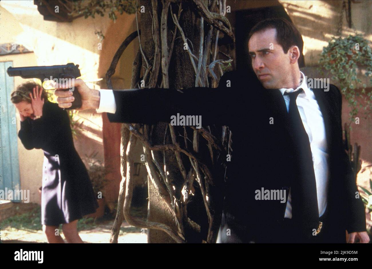 Joan Allen & Nicolas Cage Film Face/Off; Face Off (USA 1997) Characters ...