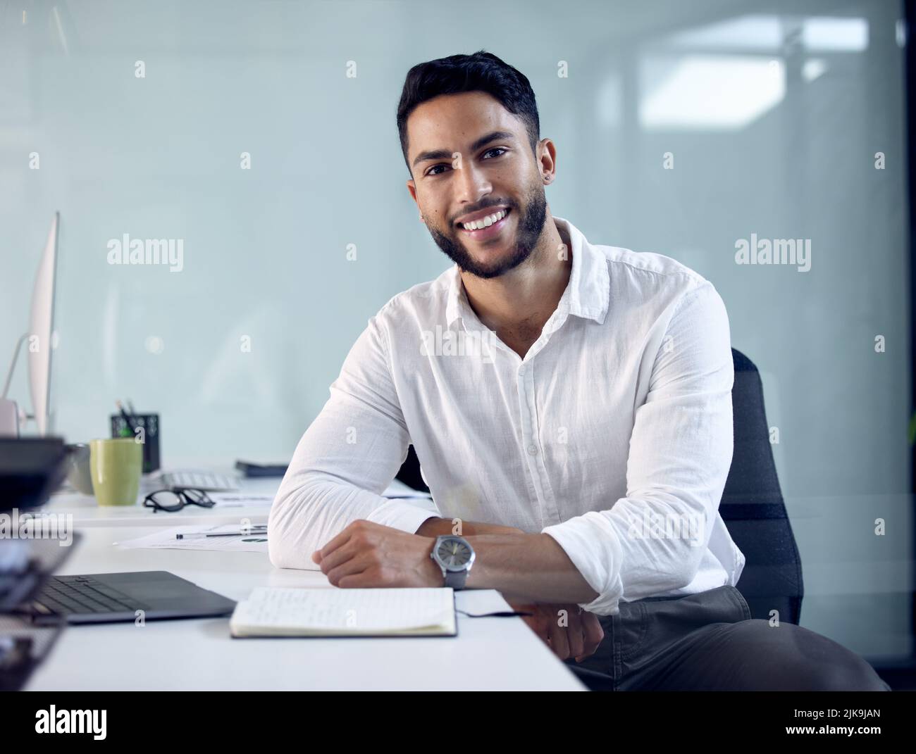 This is where the magic happens. a young businessman sitting at his ...