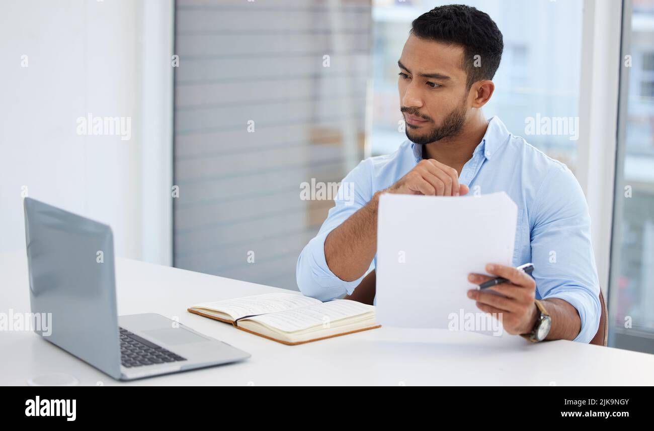 Making sure he understands all the conditions. a young businessman ...