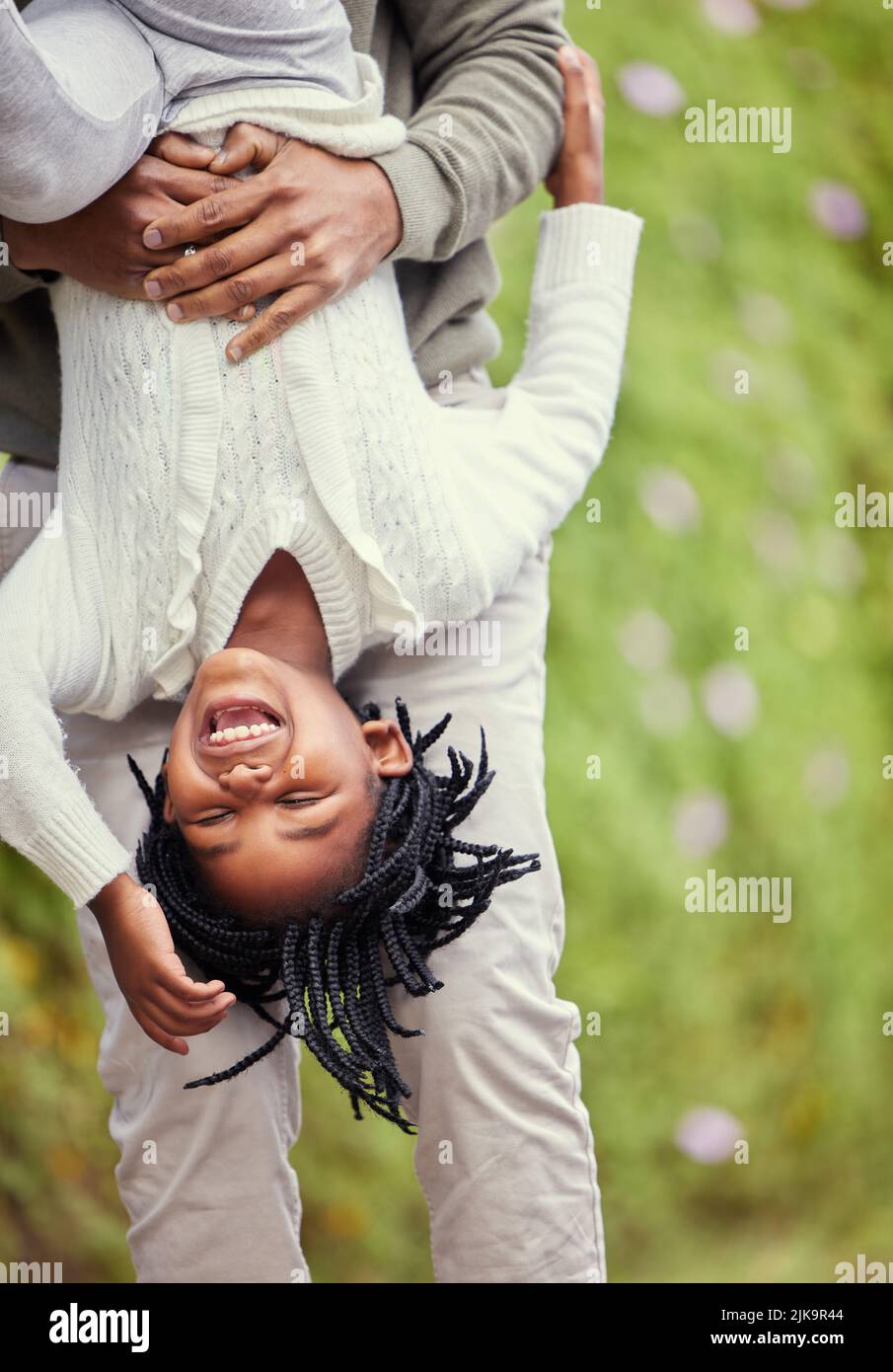 Young and free. a young girl playing with her father in nature Stock ...