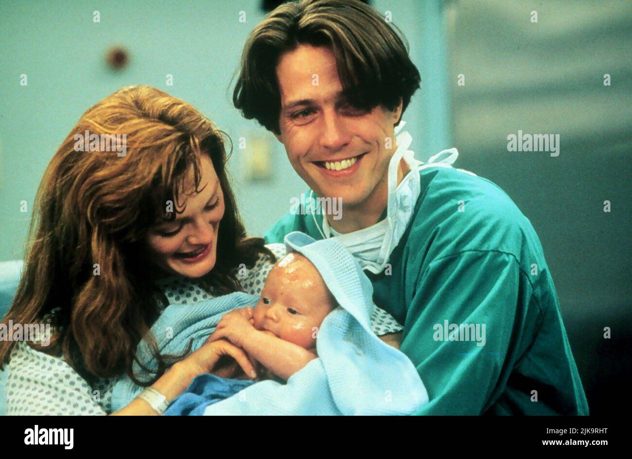 Julianne Moore & Hugh Grant,Baby Film Nine Months (USA 1995) Characters: Rebecca Taylor,Samuel ...