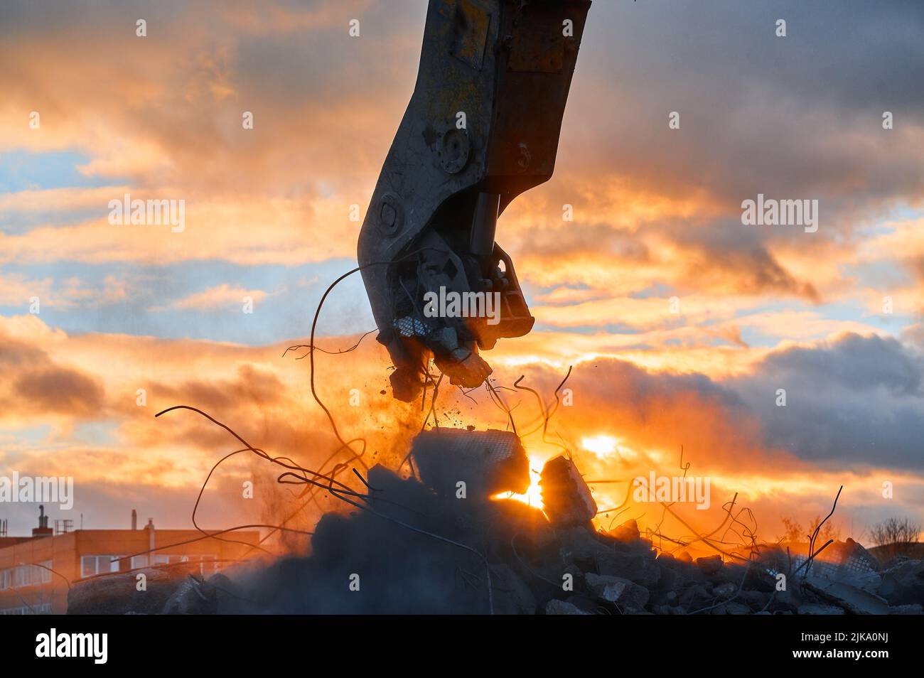 Metal crusher on excavator rigging destroys armored concrete Stock ...