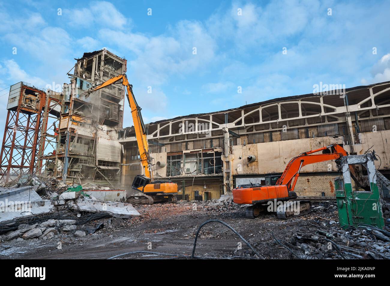 Hydraulic excavators at demolition site of industrial complex Stock ...
