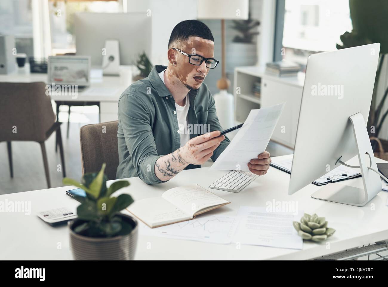 Do one thing every day that scares you. a young business man working in ...