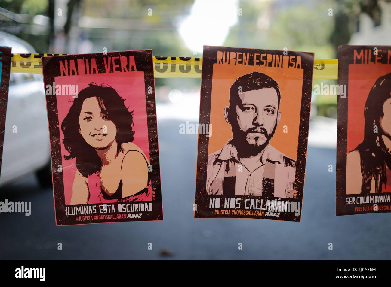 Signs with the photographs of the 5 people murdered 7 years ago in ...