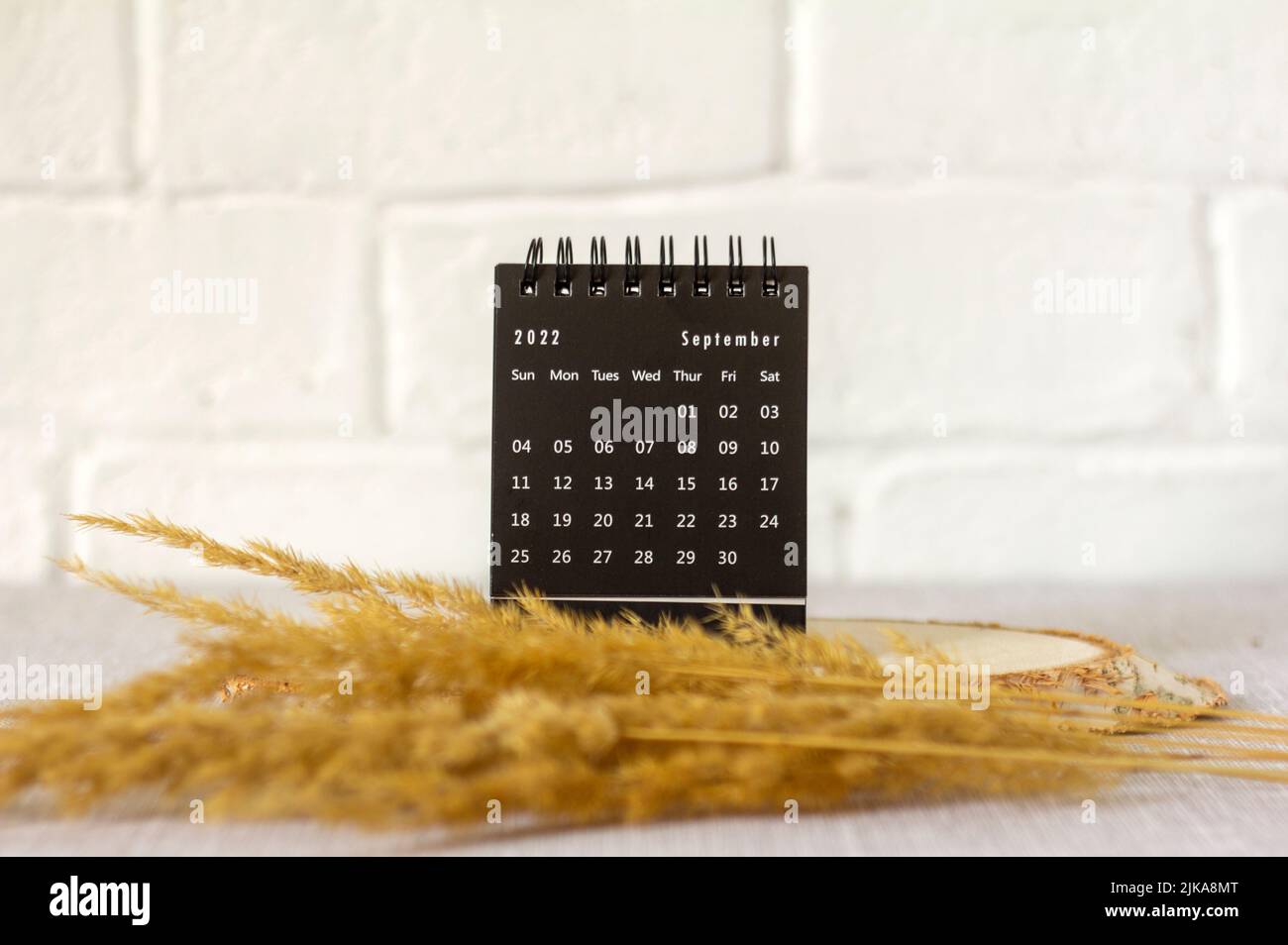 Desktop calendar for September 2022 on the table Stock Photo - Alamy