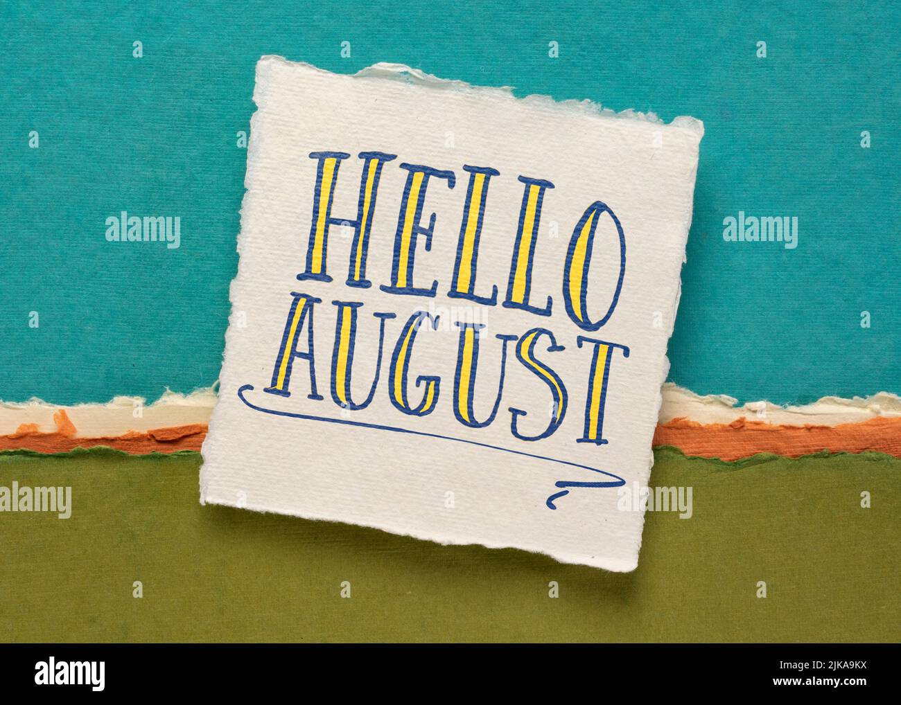 Hello August greeting note - handwriting on a white handmade paper ...