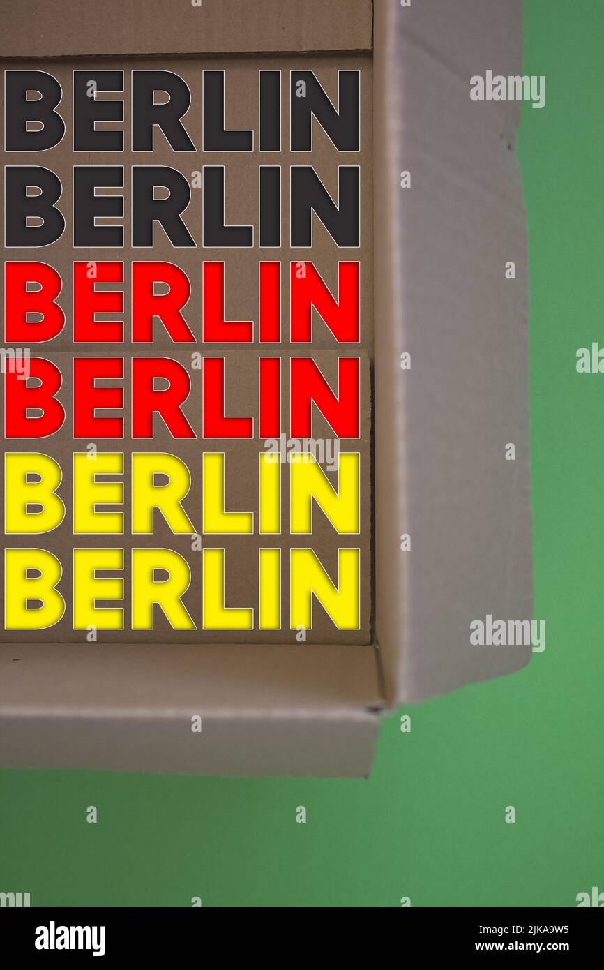 Berlin word with cardboard box. Brown folded cardbox Stock Photo - Alamy