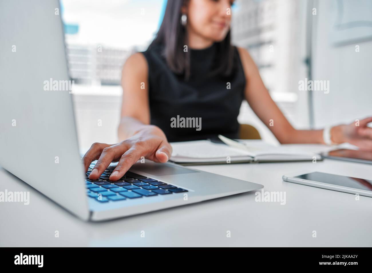 Grateful for my touch typing skills. an unrecognizable businesswoman ...