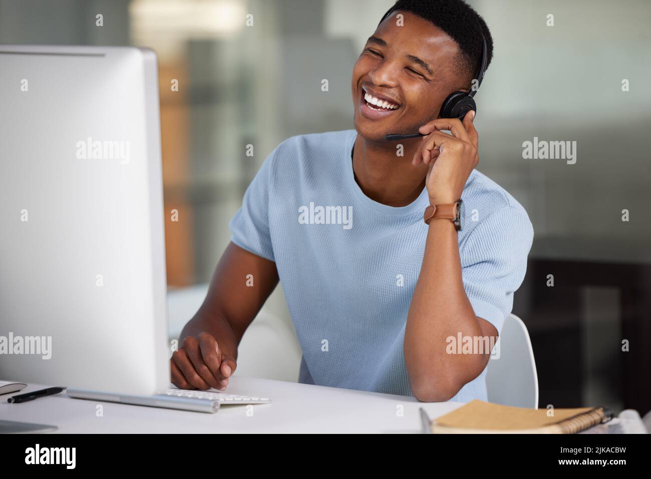Staying friendly and polite to all his customers. a young businessman ...