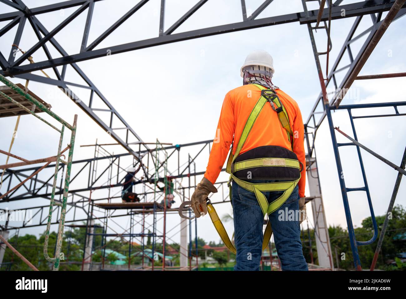 Workers prepare to go up with Fall arrestor device for worker with ...