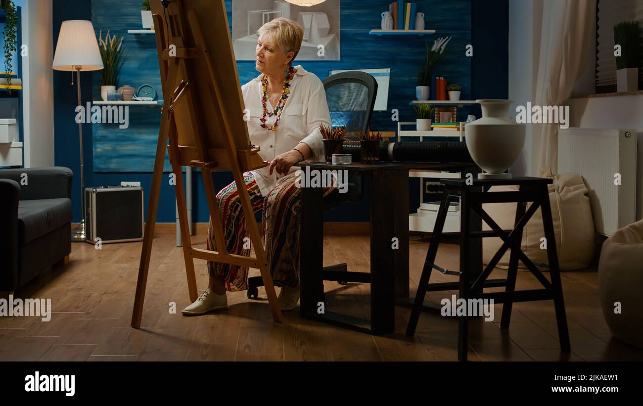 Professional retired person drawing artistic vase model using design ...