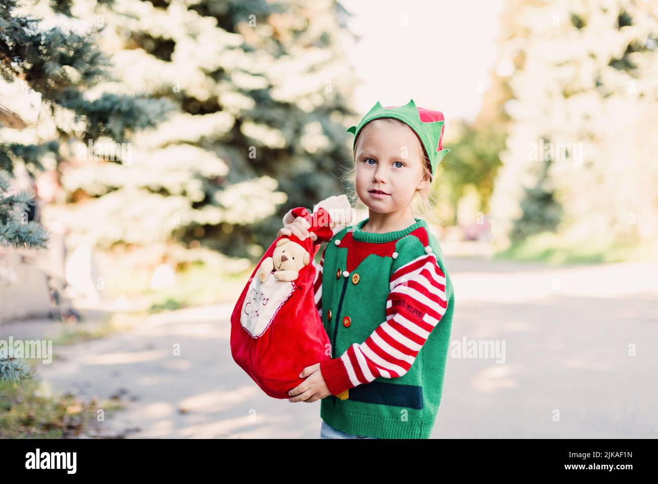 Christmas in july. children elf ears. Child waiting for Christmas in ...