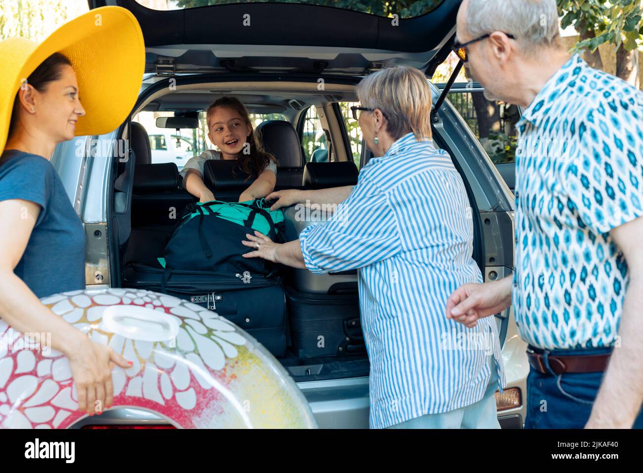 Loading luggage small car hi-res stock photography and images - Alamy