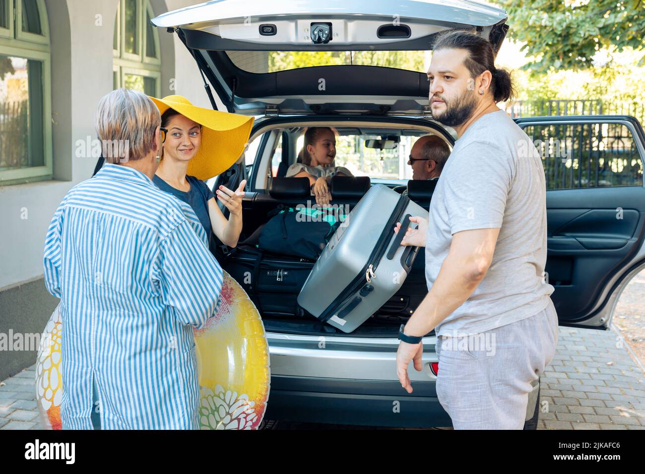Loading luggage small car hi-res stock photography and images - Alamy