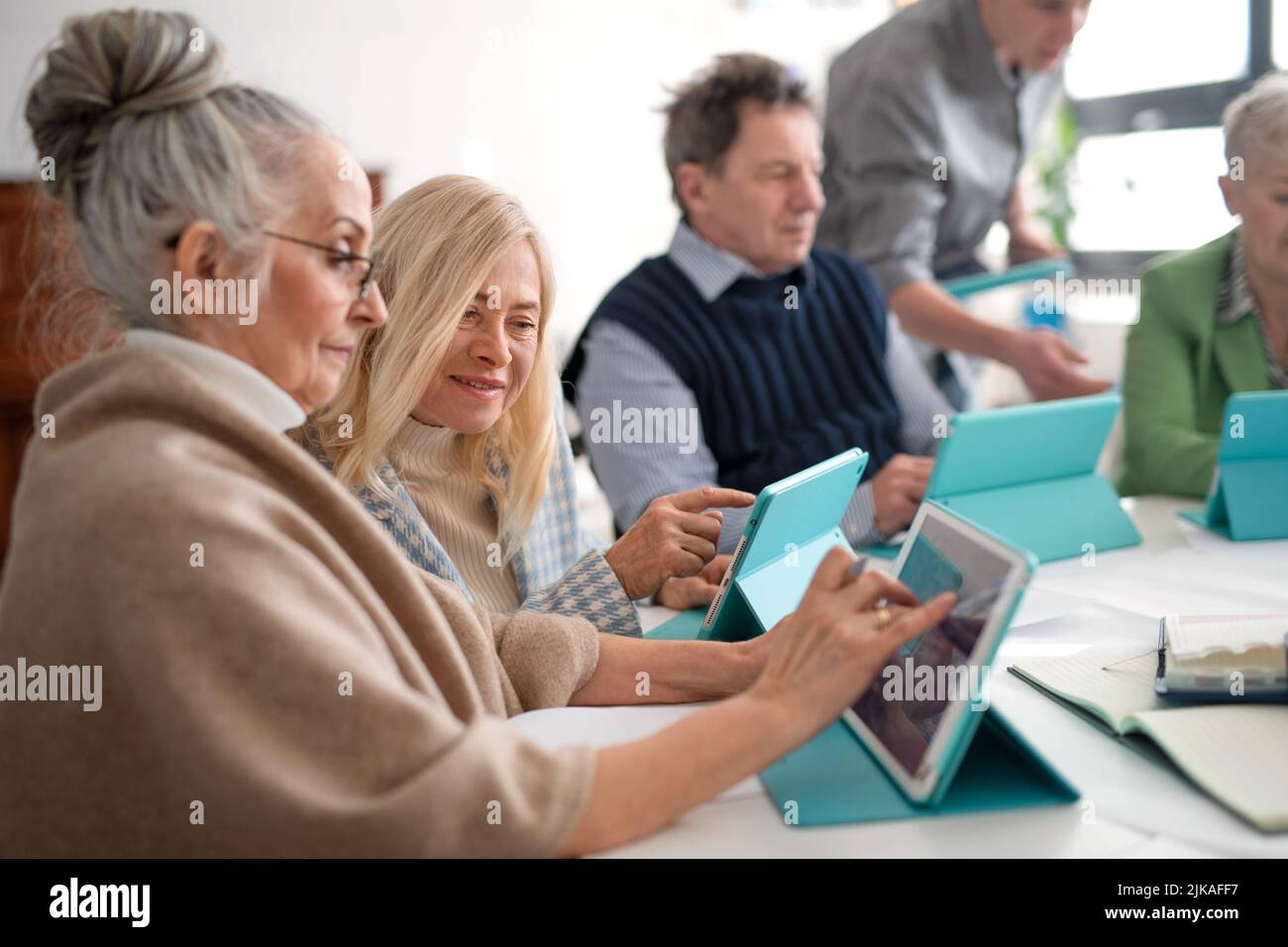 Student attending class with tablet hi-res stock photography and images ...