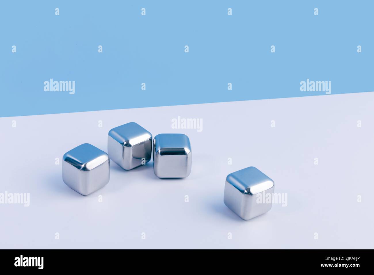 creative summer photo of ice, blue background Stock Photo - Alamy