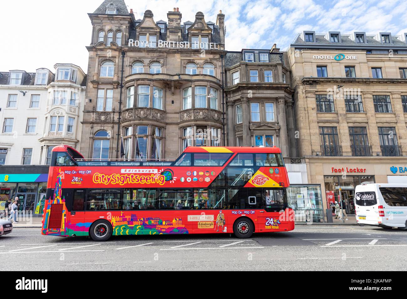 Edinburgh city sightseeing double decker red bus on Princes street ...