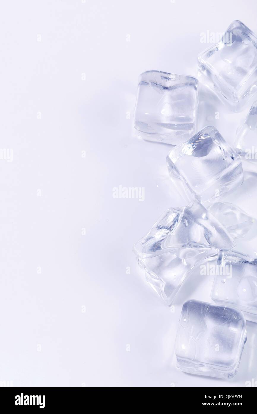 creative summer photo of ice, white background Stock Photo - Alamy