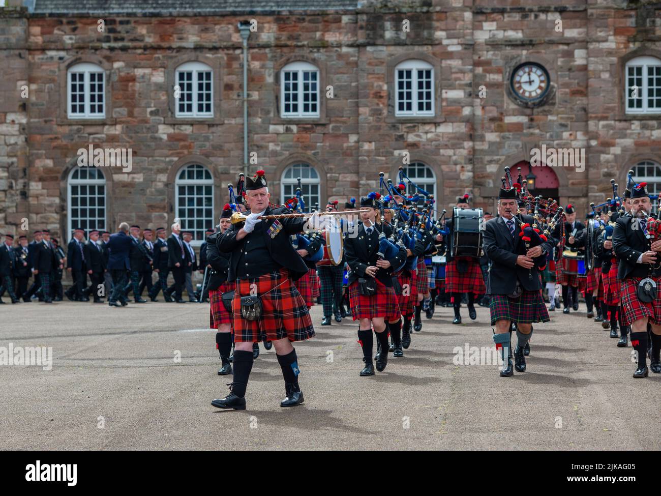 Pipe band leading parade of veterans of the KOSB in Berwick Barracks ...