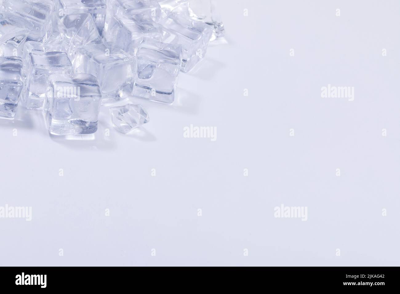 creative summer photo of ice, white background Stock Photo - Alamy
