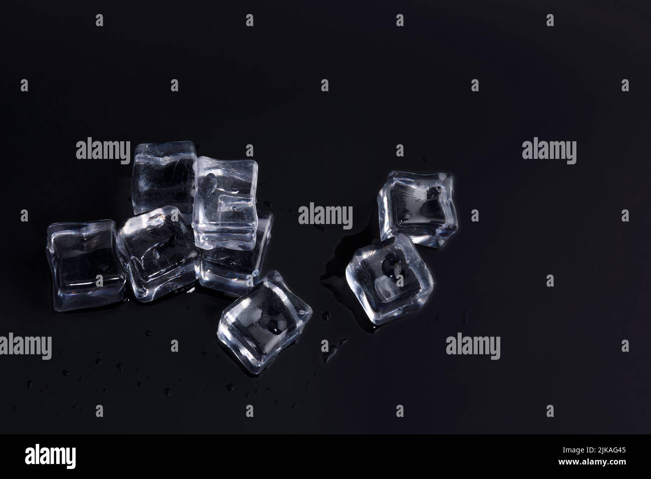 creative summer photo of ice, black background Stock Photo - Alamy