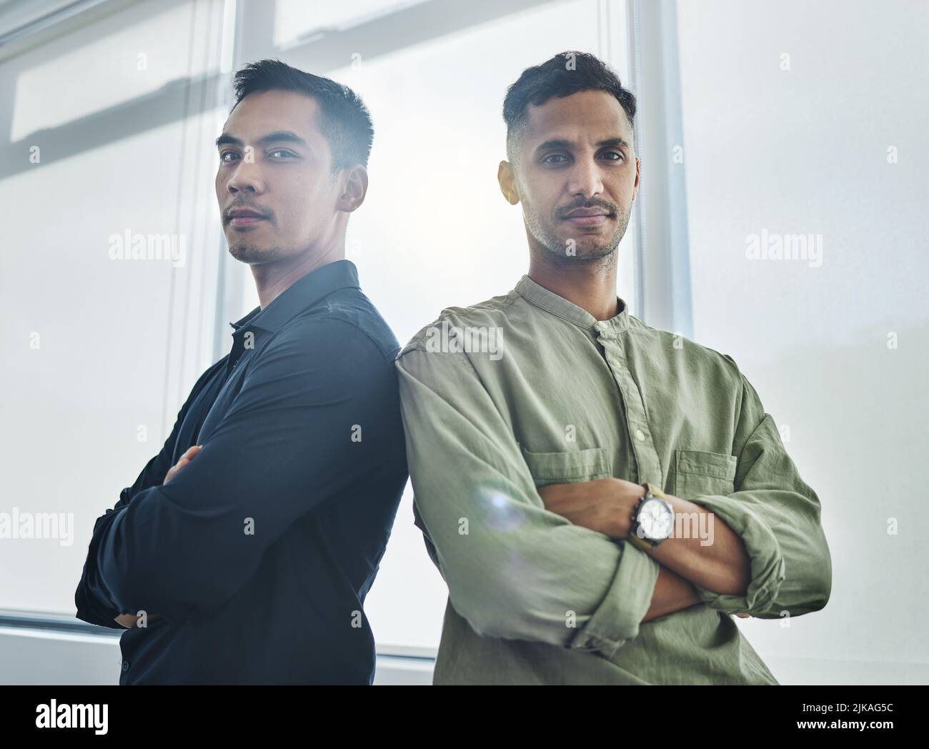 Weve got each others backs. Cropped portrait of two handsome young ...