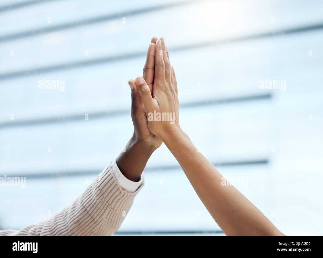 Success stems from our combined efforts. Closeup shot of two ...
