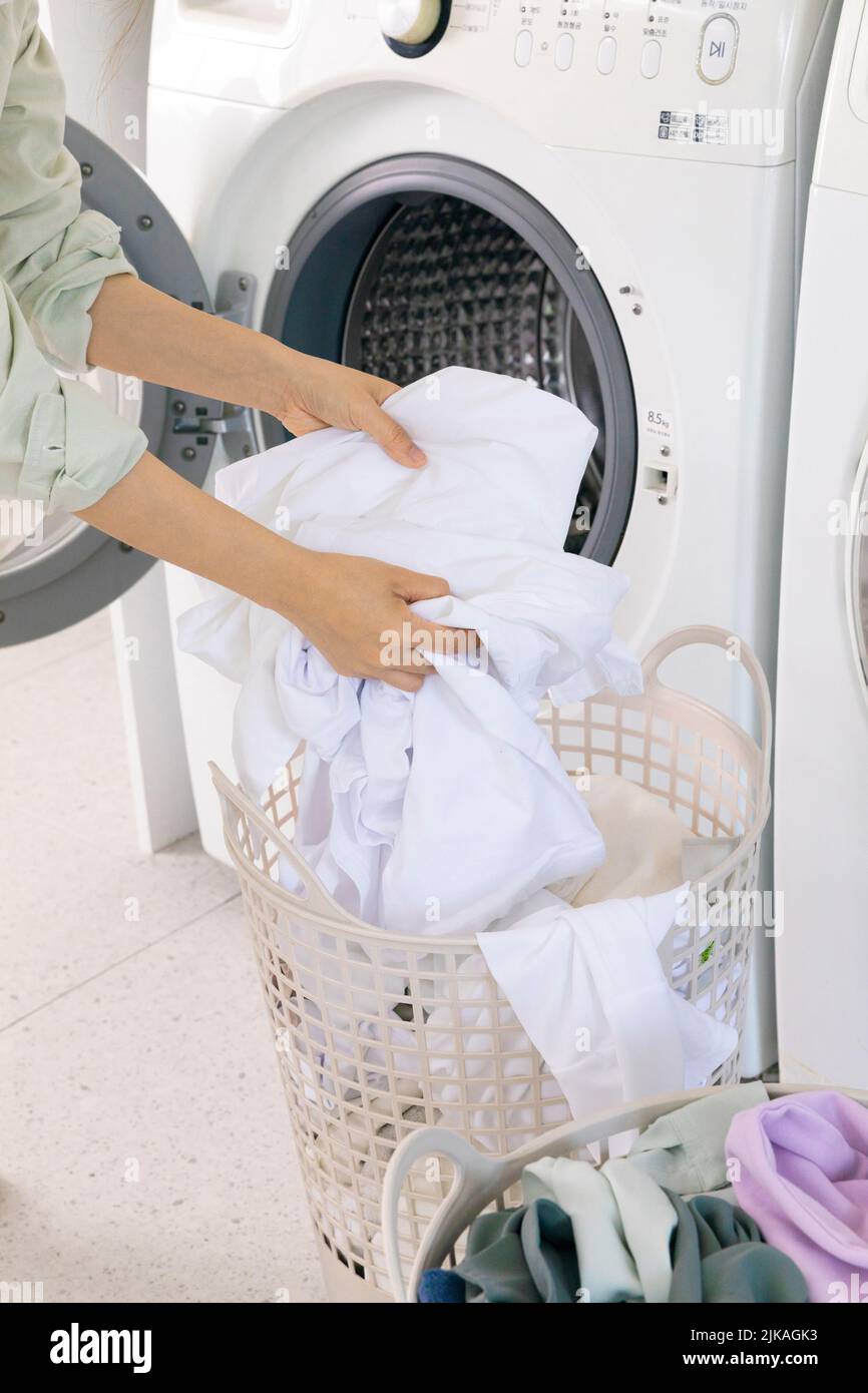 aesthetic laundry concept white clothing laundry Stock Photo - Alamy