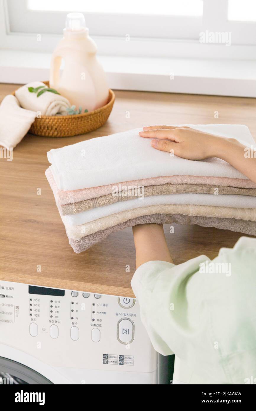 aesthetic laundry concept detergent and towel Stock Photo - Alamy