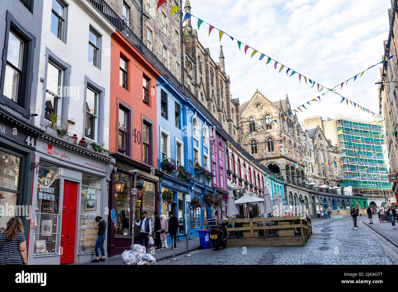 Victoria street Edinburgh Old Town on summers day in 2022, brightly ...