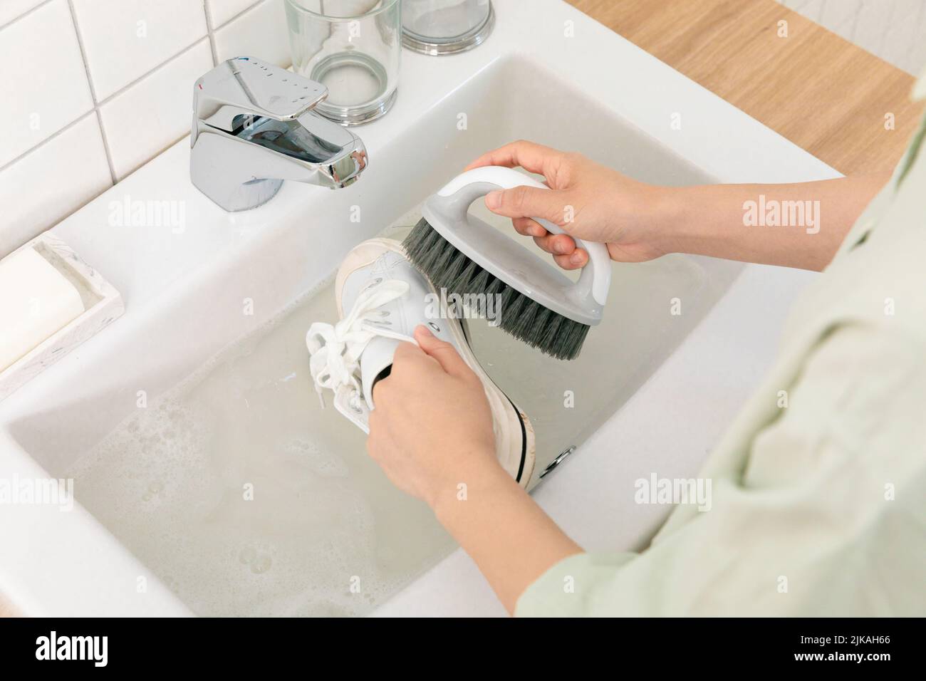 aesthetic laundry concept Washing sneakers Stock Photo - Alamy