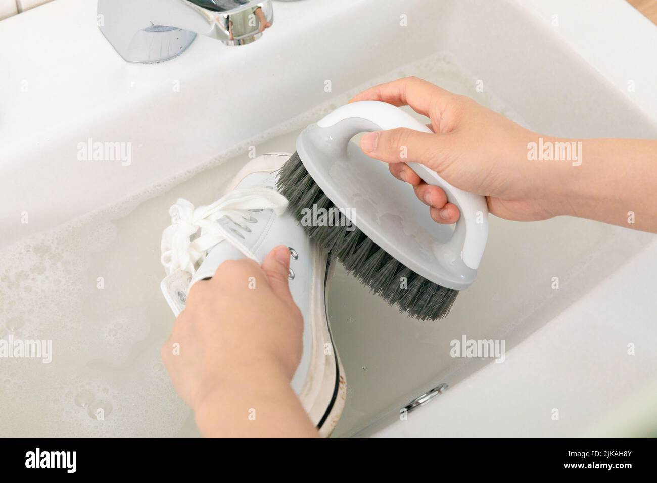 aesthetic laundry concept Washing sneakers Stock Photo - Alamy