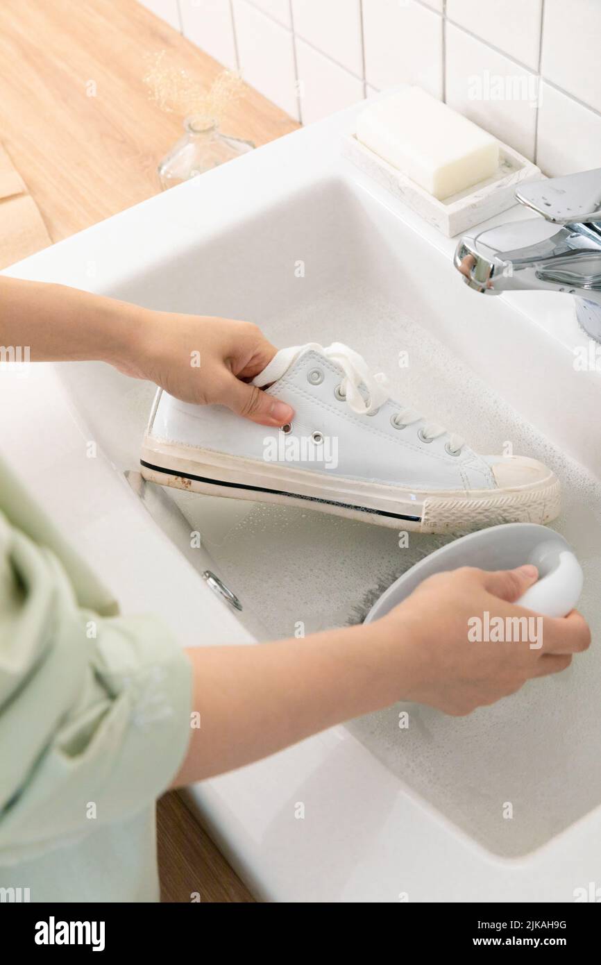 aesthetic laundry concept Washing sneakers Stock Photo - Alamy