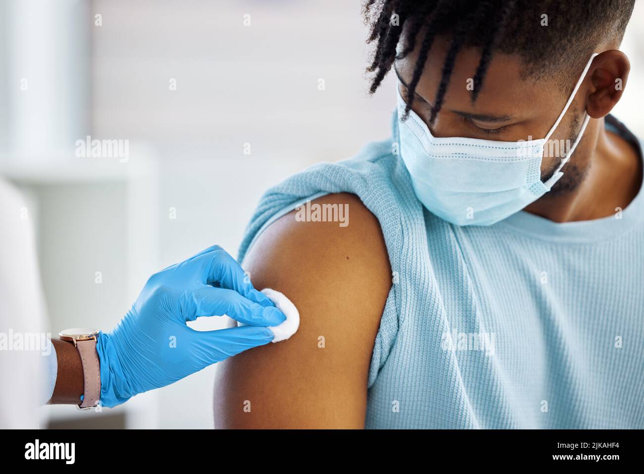 You might have a little bit of bleeding. a doctor holding a cotton ball ...