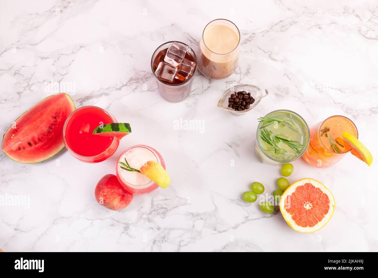 Summer drink background with watermelon, green grapes and grapefruit ...