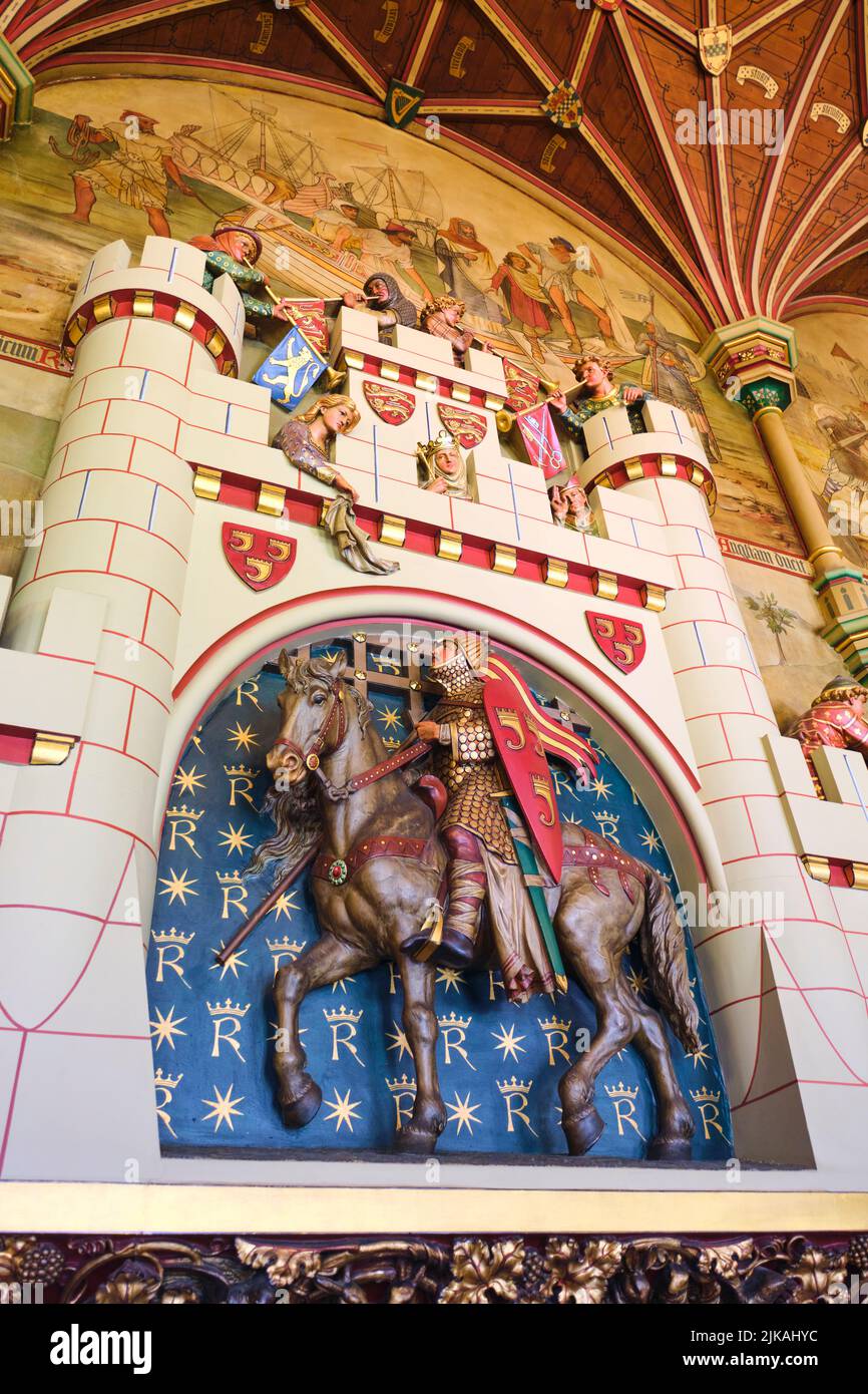 The richly carved and painted knight on a horse, going through the ...