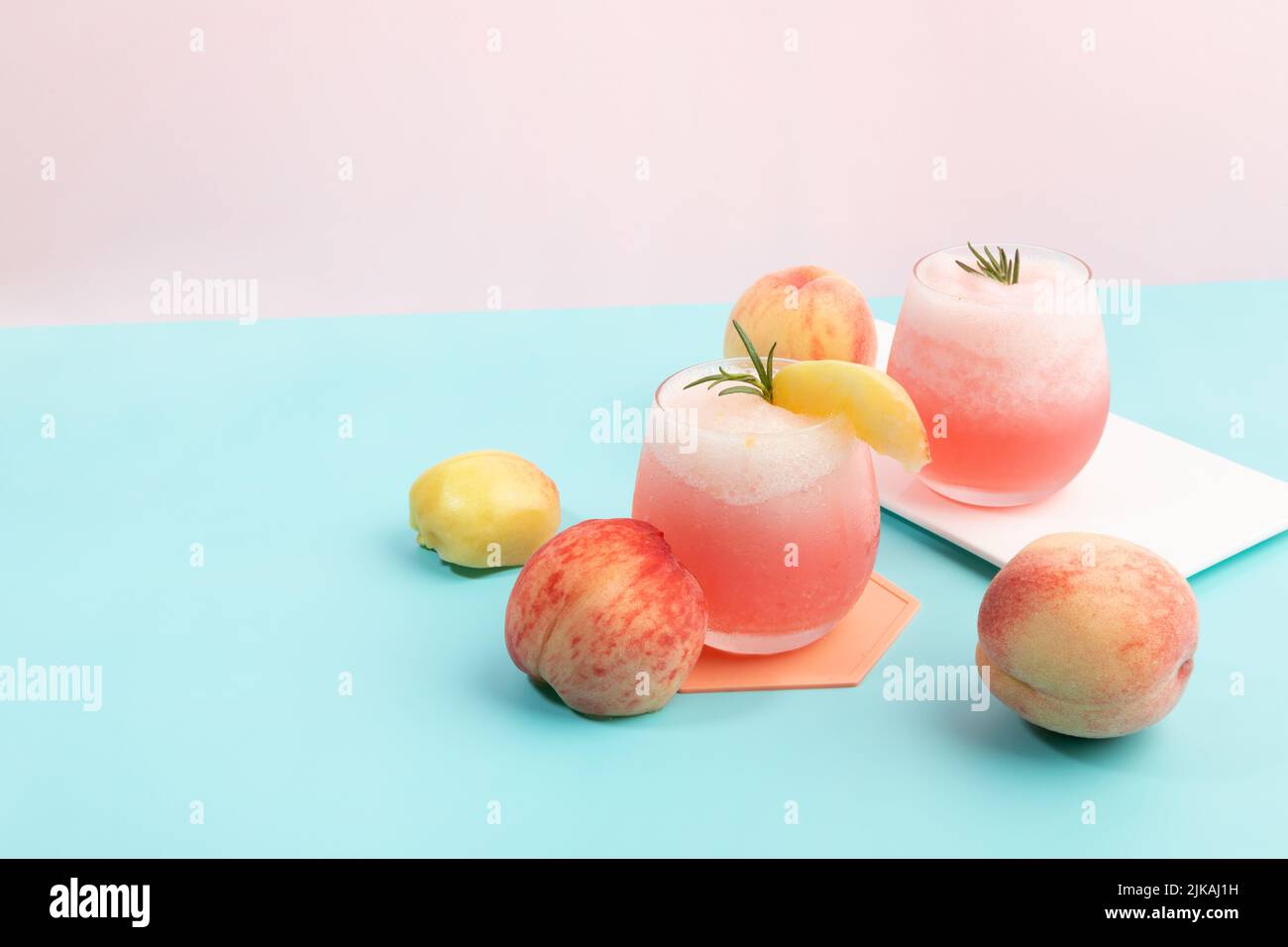 summer background with peach ade drink with peaches fruit Stock Photo ...
