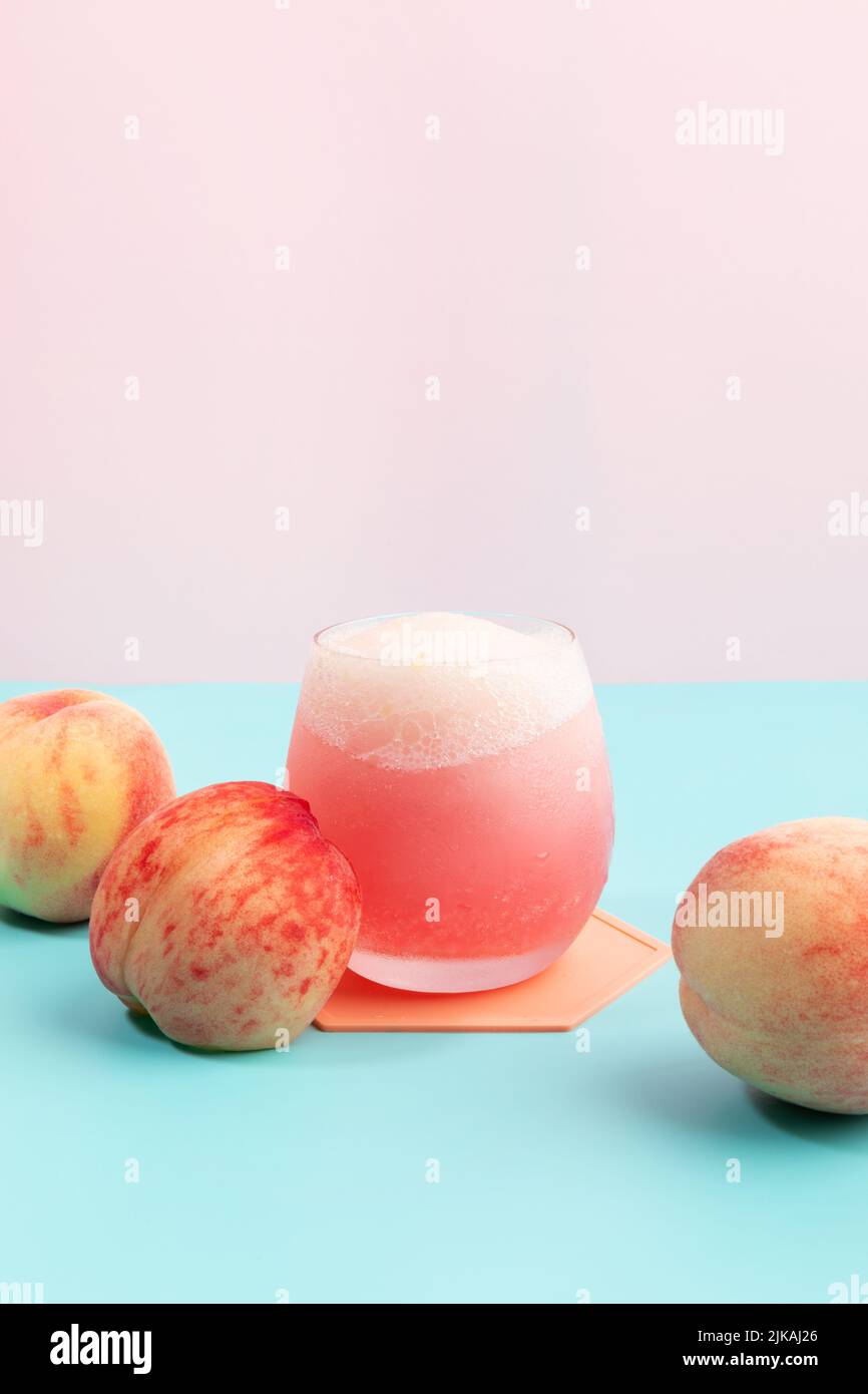 summer background with peach ade drink with peaches fruit Stock Photo ...