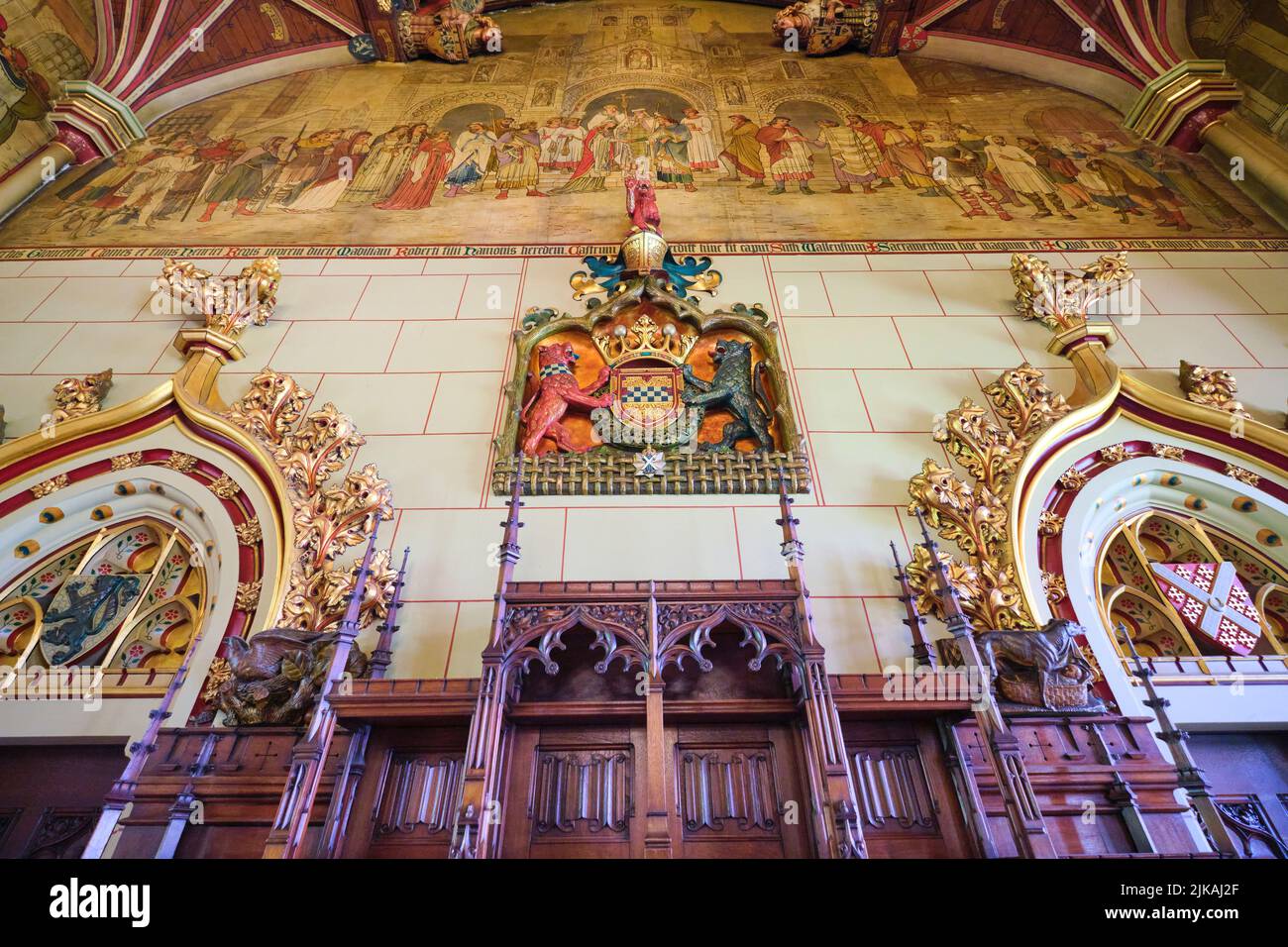 The royal crest carving in the wall under a big mural at the end of the ...
