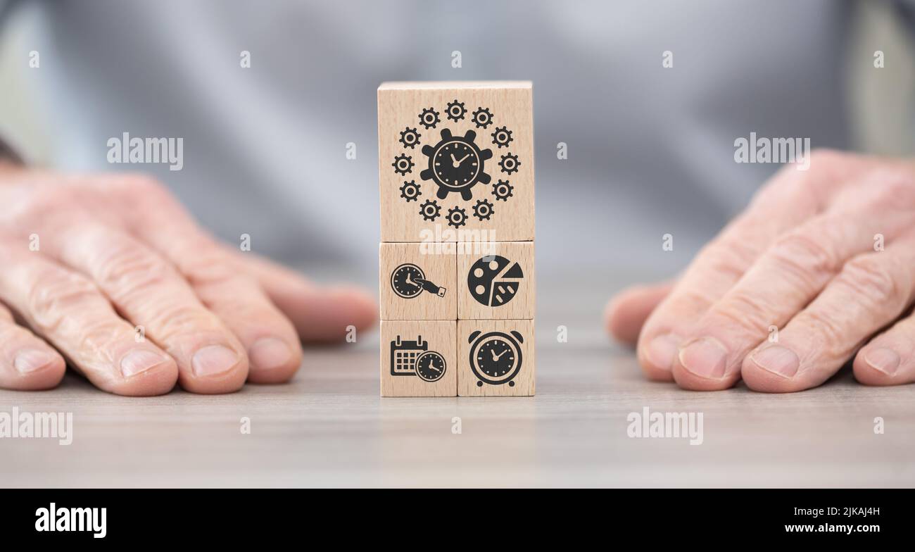 Wooden blocks with symbol of time management concept Stock Photo - Alamy
