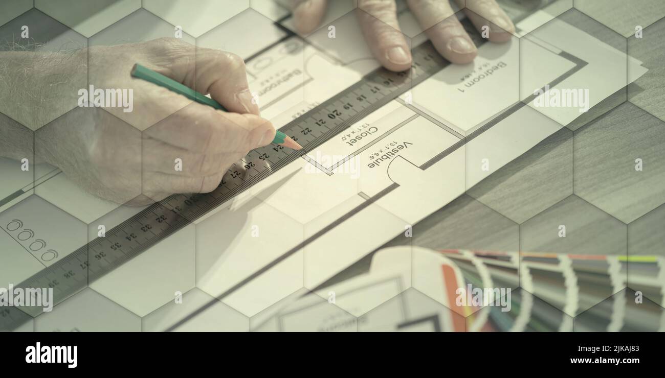 Architect working on a project and using a ruler, geometric pattern ...