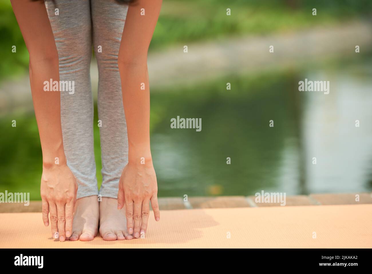 Forward bending stretch hi-res stock photography and images - Alamy