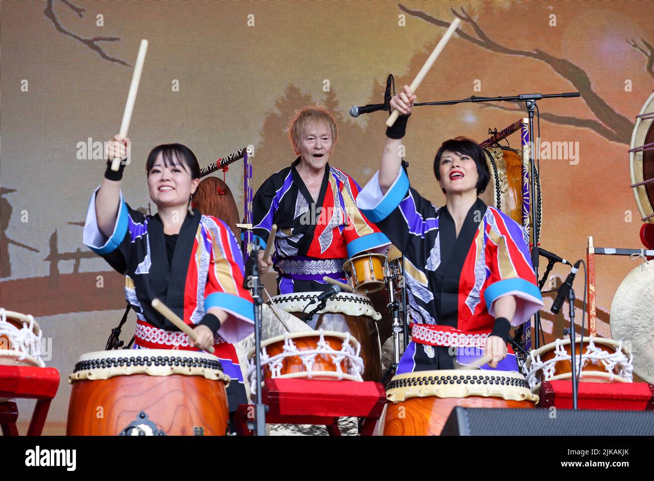 Joji Hirota and the London Taiko Drummers perform on the Open Air Stage. WOMAD RETURNS FOR ...