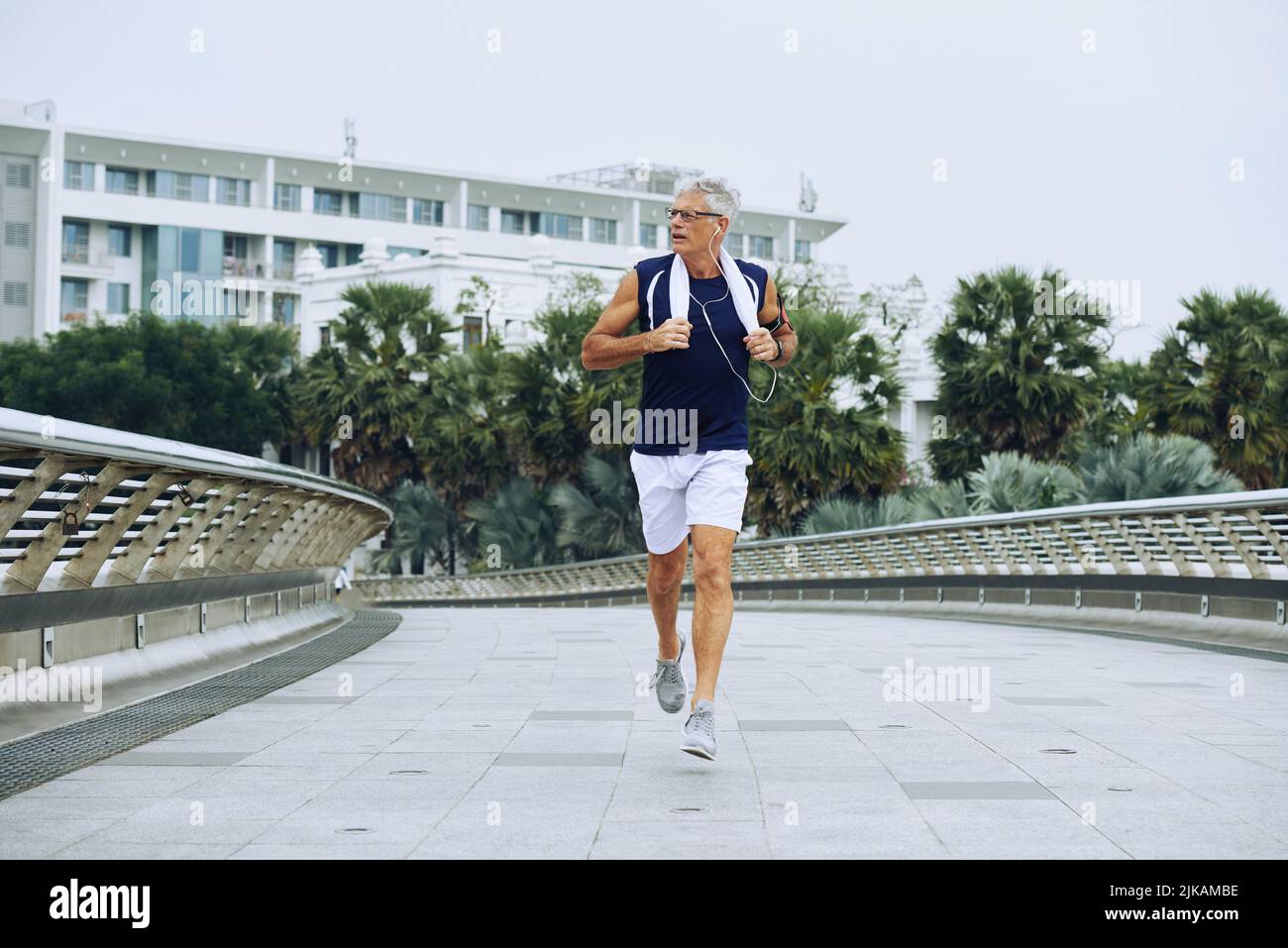 Senior man running in hi-res stock photography and images - Alamy