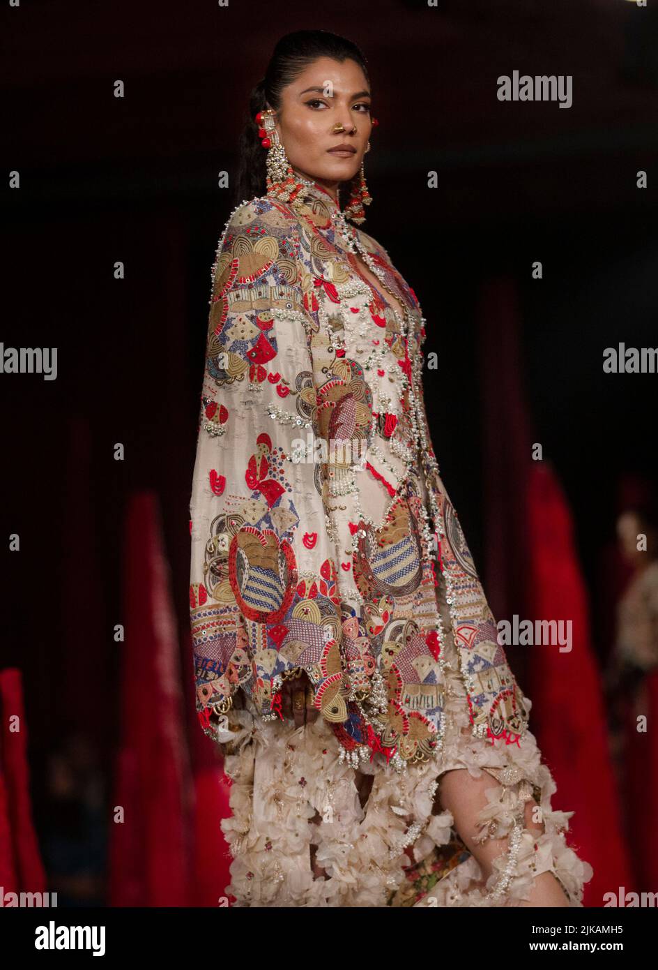 New Delhi. 31st July, 2022. A model presents a creation by Indian ...